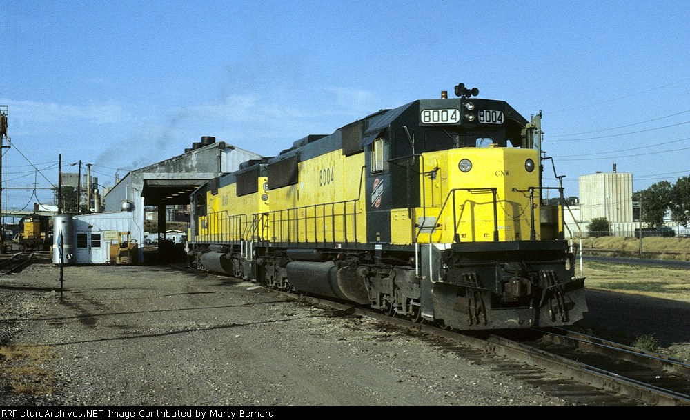 C&NW 8004 and a Sisiter Wait Their Call